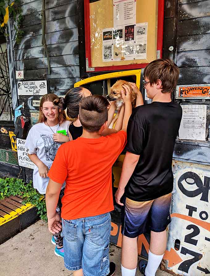 Visitors interact with one of the many surprising elements that make this more than just a typical haunted house.