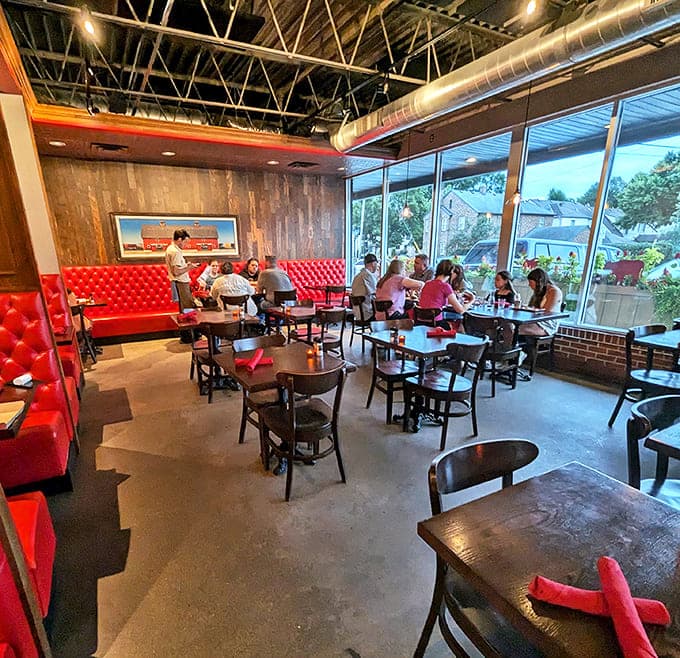 The dining room hums with happy conversation as patrons enjoy the perfect blend of casual comfort and culinary excellence.