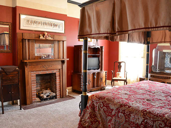 A bedroom where even the fireplace looks elegant, perfect for romantic getaways or solo retreats alike.