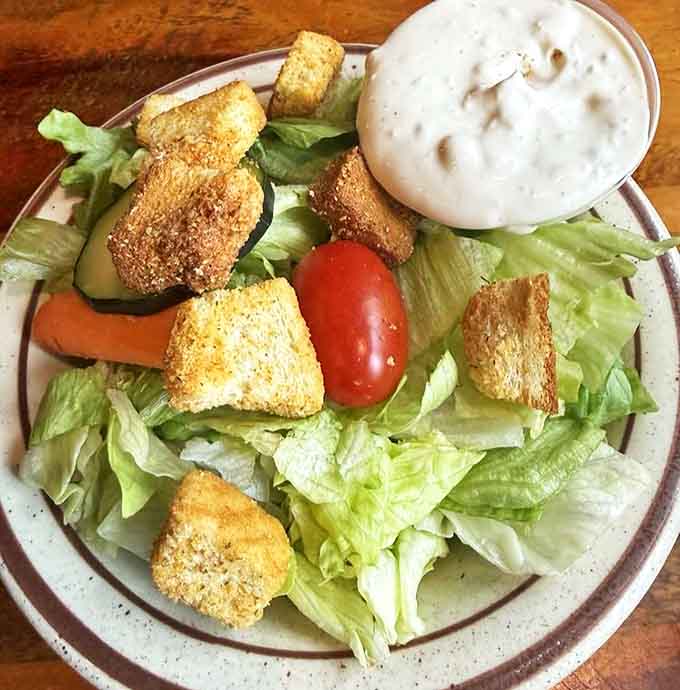A riot of colors and textures, this noodle salad combines fresh herbs, crunchy vegetables, and tangy dressing for a refreshing palate pleaser.