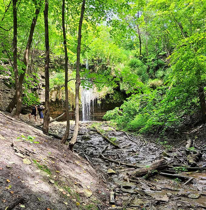 Summer brings lush greenery that frames the falls in emerald splendor, offering cool respite on even the hottest days.