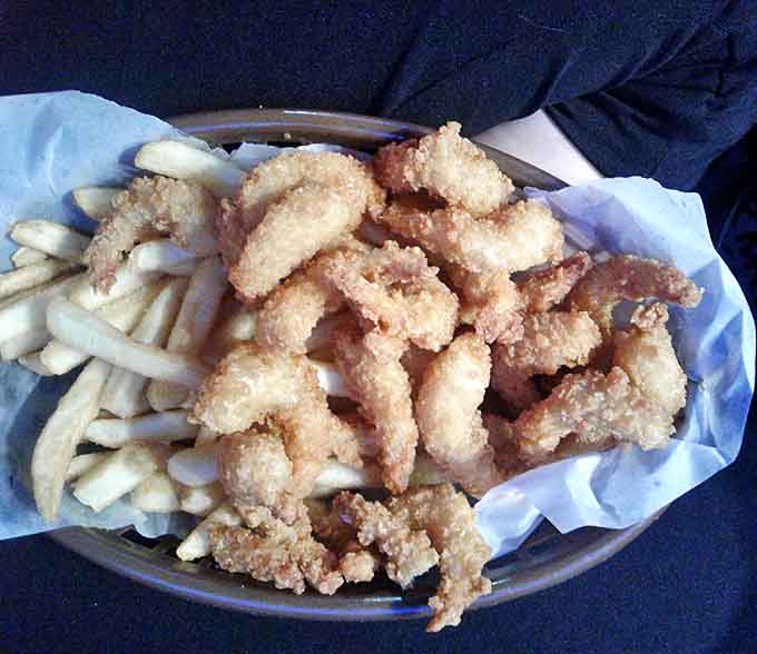 The shrimp basket represents seafood done right &ndash; crispy, golden treasures nestled alongside fries that make you wonder why you'd ever eat anywhere else.