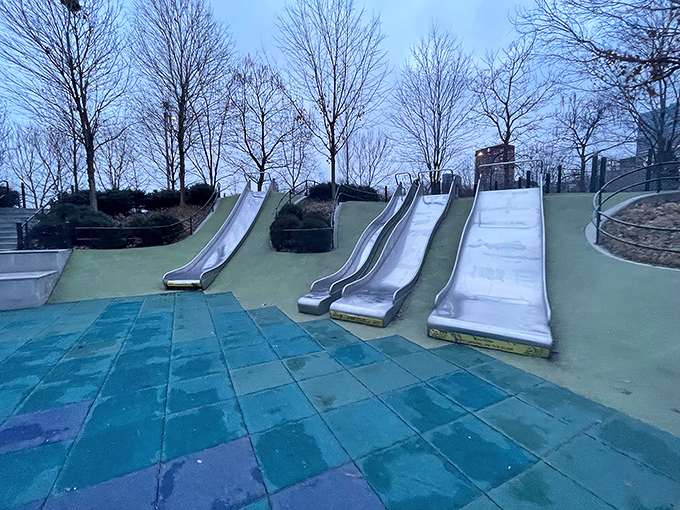 Four slides, infinite joy &ndash; these parallel metal chutes promise an exhilarating descent that'll have you racing back up for "just one more."