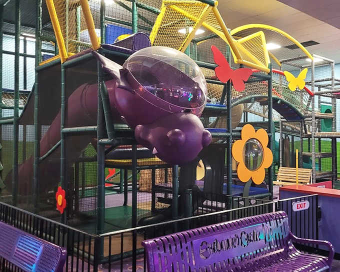The soft play area's giant purple caterpillar structure offers little adventurers a safe space to climb, crawl, and conquer.