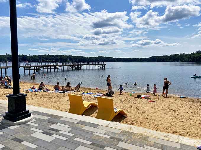 Stone Lake Beach welcomes families seeking summer memories, with shallow waters perfect for young swimmers and sandcastle architects.