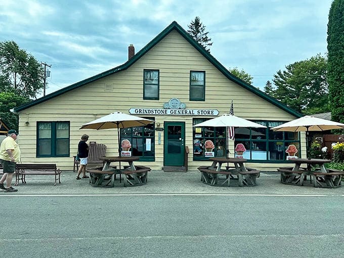 The storefront welcomes visitors with that timeless general store appeal, complete with benches for resting and windows that practically beg you to peek inside.
