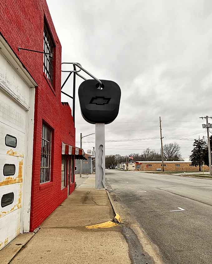 Main Street meets absurdity as the World's Largest Truck Key towers over Casey's charming downtown area.