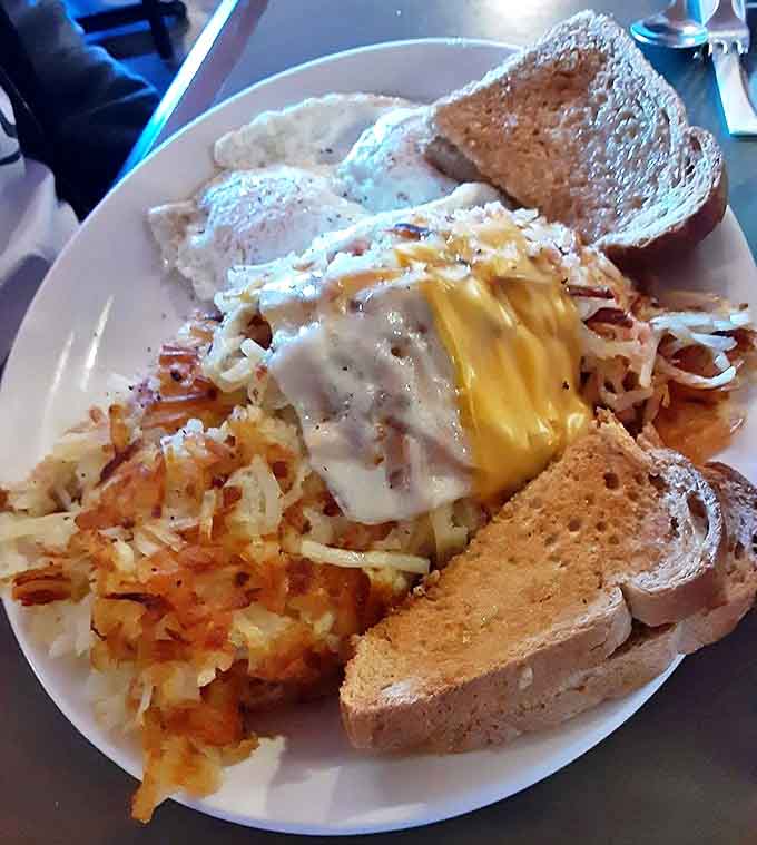 Stuffed hash browns that could feed a lumberjack &ndash; crispy outside, tender inside, with eggs perched majestically on top.