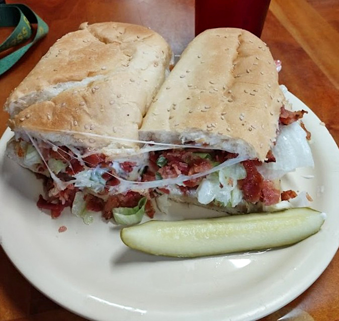 This BLT sub isn't just a sandwich &ndash; it's architecture with bacon, where structural integrity meets mouthwatering flavor in perfect harmony.