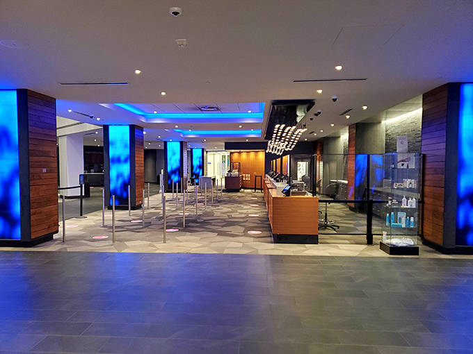 The lobby welcomes guests with contemporary design and subtle lighting, setting the stage for the tropical paradise that awaits beyond.