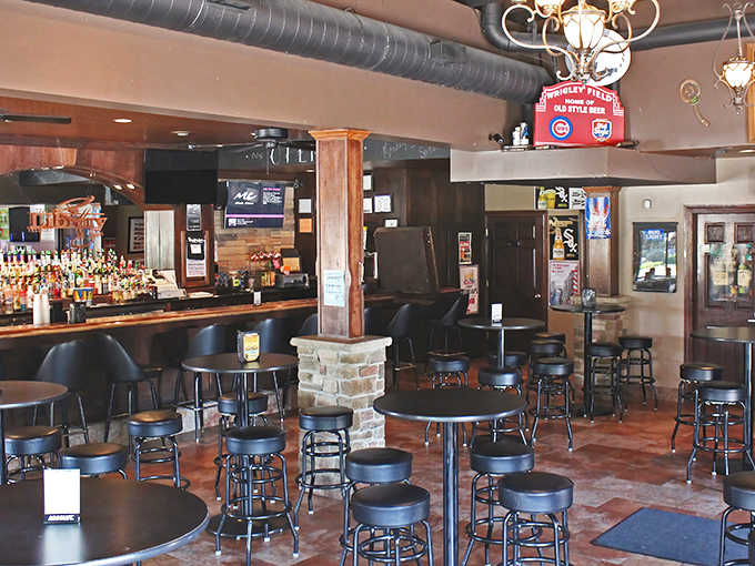 The dining area balances casual comfort with subtle sophistication, where high-top tables invite conversation and lingering over drinks.