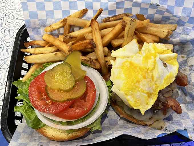 This burger and fries combo looks like it walked straight out of a 1950s advertisement into reality.