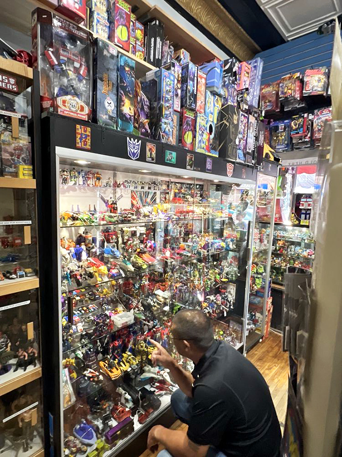 Behind glass, Transformers await their next mission: making grown adults squeal with delight and reach for their credit cards immediately.