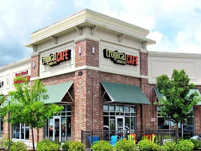 Tropical Cafe brings vacation vibes to the Midwest, where smoothies and smiles flow freely under the cheerful brick-corner awning.