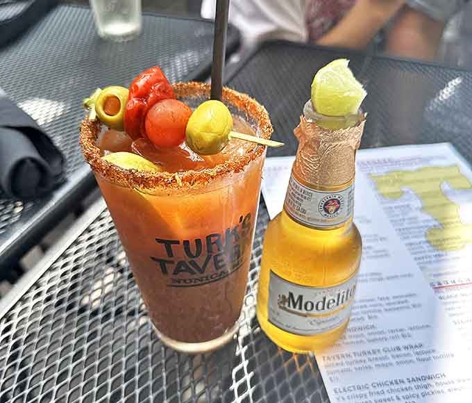 Turk's Bloody Mary comes fully loaded with garnishes and rimmed with a secret spice blend, turning a simple cocktail into a meal-worthy experience.