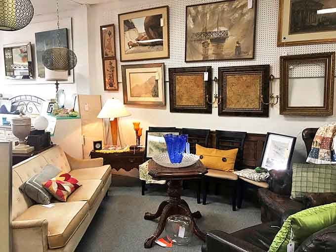 Furniture and frames arranged with the kind of casual elegance that looks effortless but absolutely isn't, creating vignettes worthy of design magazines.