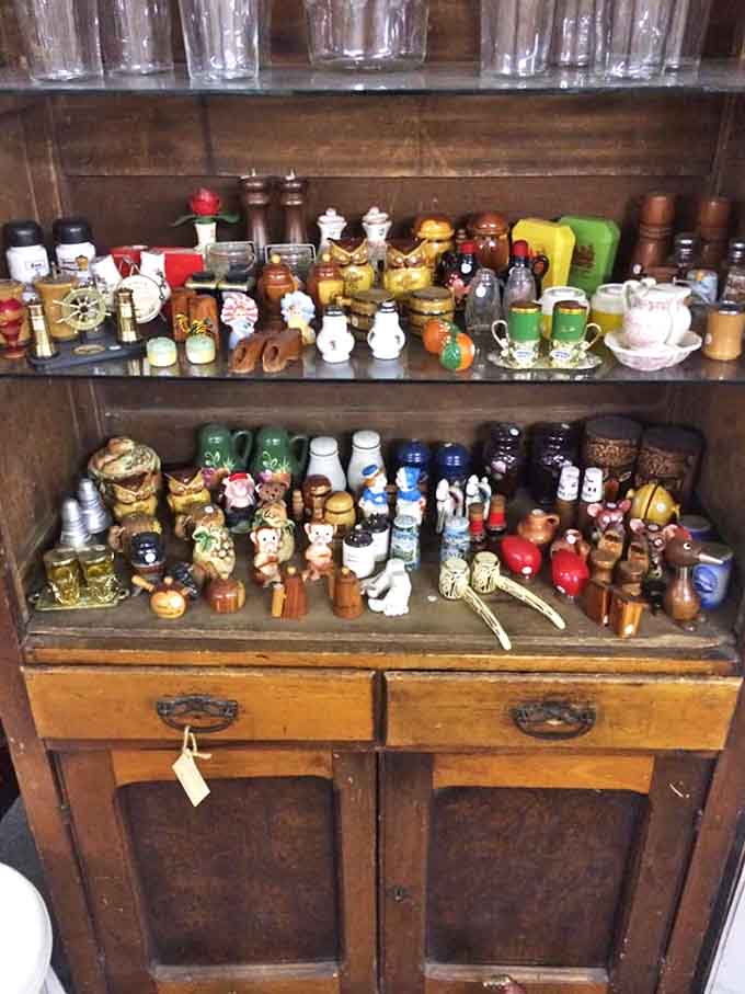 Garden gnomes plotting their next adventure among the vintage treasures, because even lawn ornaments need a day off.