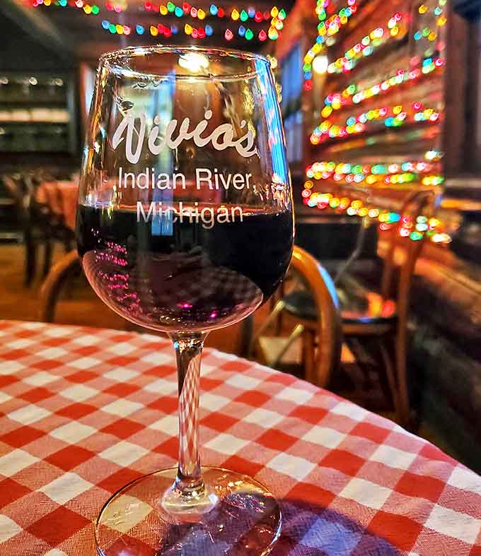 "Vivio's, Indian River, Michigan" &ndash; not just words on a wine glass, but a promise of good times and great flavors ahead.