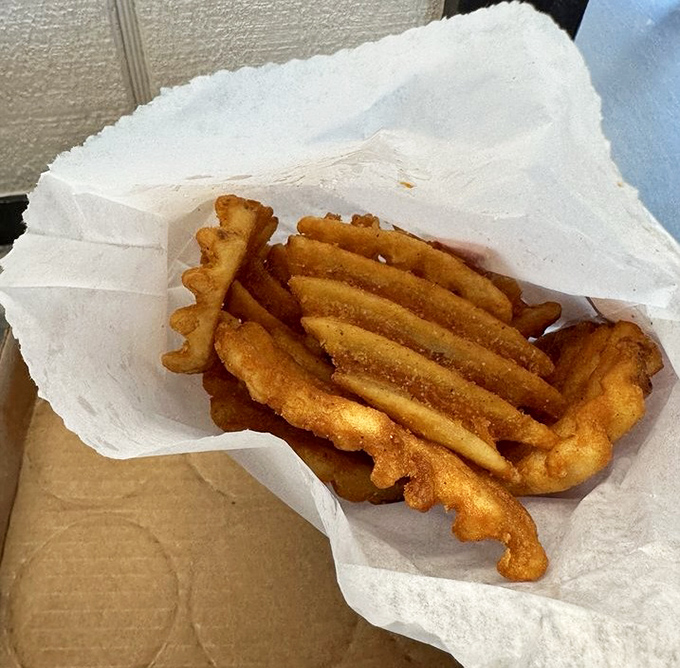 Waffle fries – where every ridge and valley creates the perfect landscape for capturing seasoning and delivering maximum crunch satisfaction.