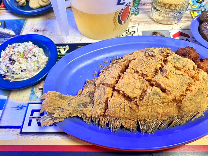 This whole flounder isn't just fried—it's transformed into a golden-brown masterpiece that would make Michelangelo put down his paintbrush and pick up a fork.