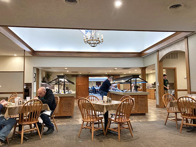 Diners settle in at wooden tables throughout the spacious restaurant, enjoying good food and even better company in comfortable surroundings.