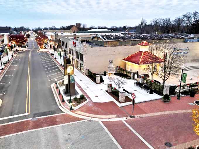 The town square comes alive at dusk, when twinkling lights transform ordinary buildings into a magical community gathering space.