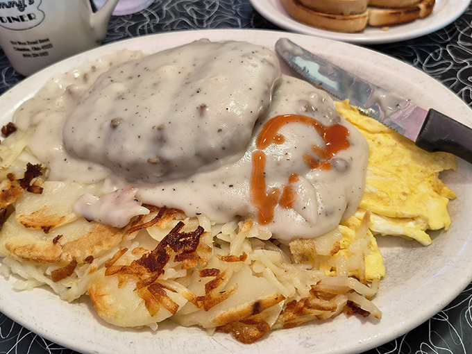 Biscuits and gravy that could make a Southern grandmother nod in approval, with eggs and hash browns playing perfect supporting roles.