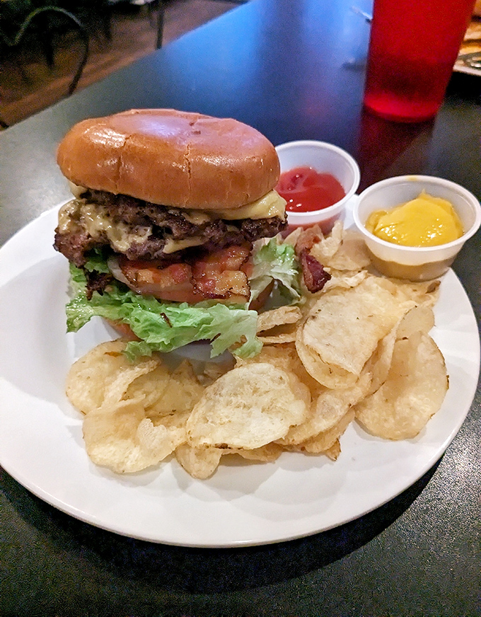 Burger perfection doesn't happen by accident &ndash; juicy, cheese-draped, and accompanied by perfectly crisp chips, this is diner food elevated to art.