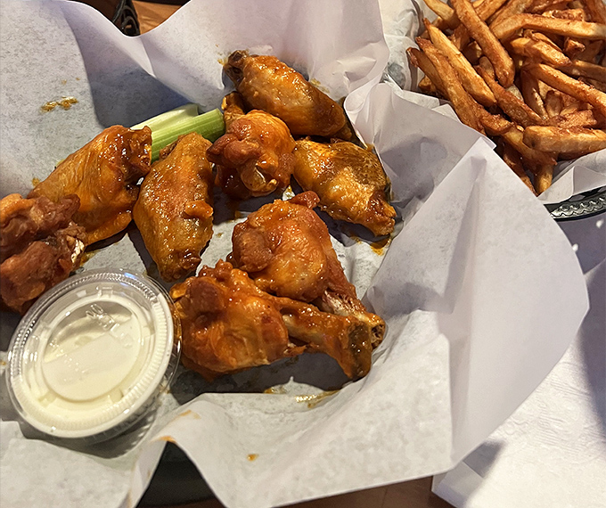 Buffalo wings that strike the perfect balance between crispy exterior and juicy interior, served with cooling ranch that's practically mandatory.