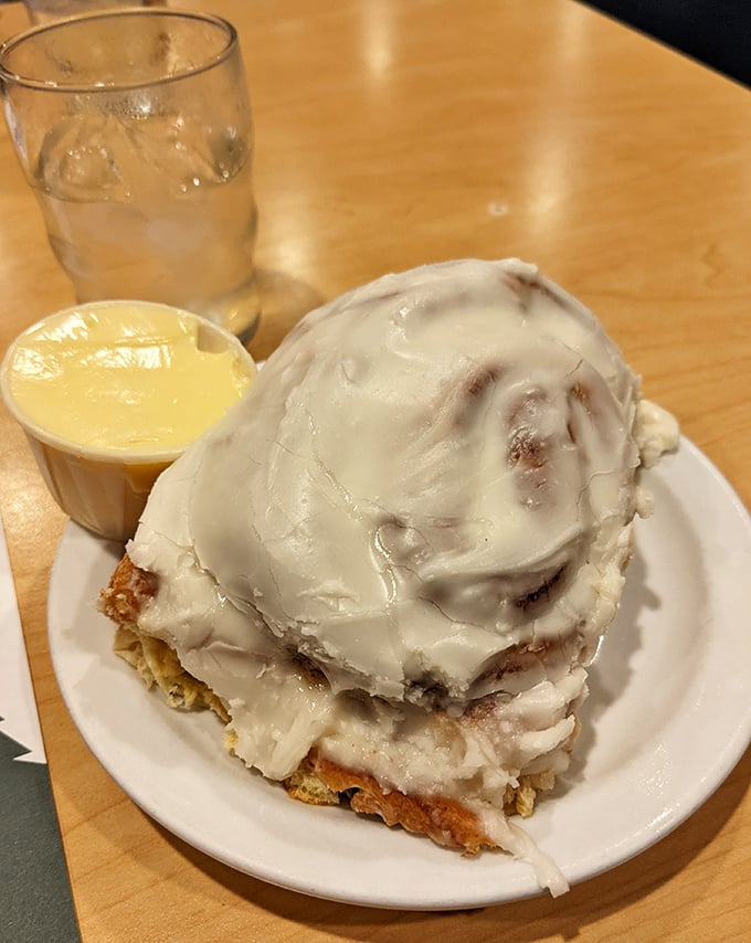 Not just a cinnamon roll &ndash; it's a spiral galaxy of sweetness with cream cheese frosting that would make astronomers weep with joy. 