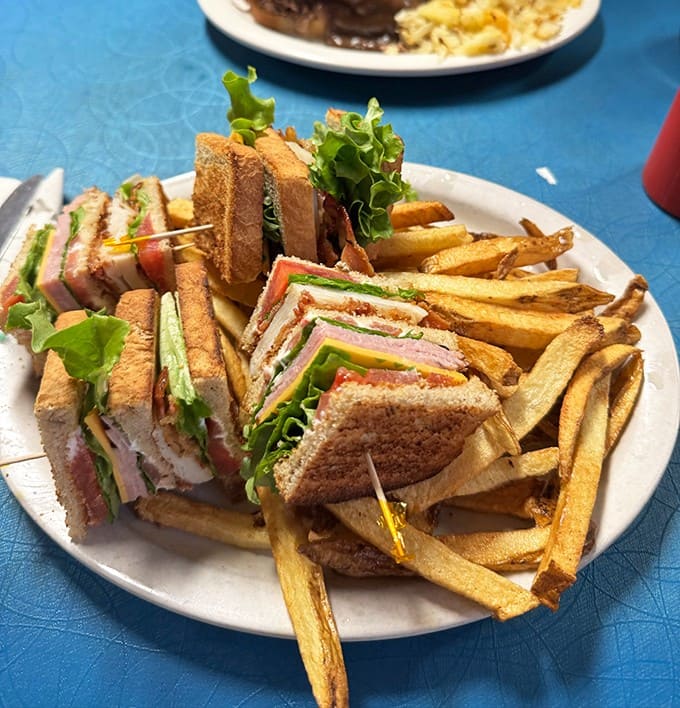 The club sandwich stands tall like an edible skyscraper &ndash; layers of meat, cheese and vegetables requiring both hands and possibly a strategy.