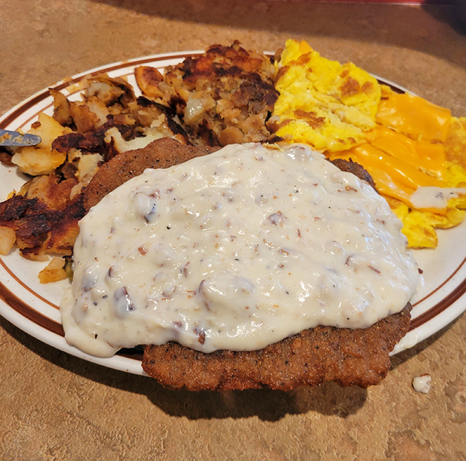 Country fried steak swimming in peppery gravy with eggs and potatoes&mdash;the breakfast equivalent of winning the lottery before 9 AM.