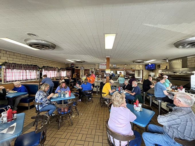 Customers: The dining room hums with the satisfied murmur of regulars and first-timers alike, all united in the universal language of "mmm" and "pass the ketchup."