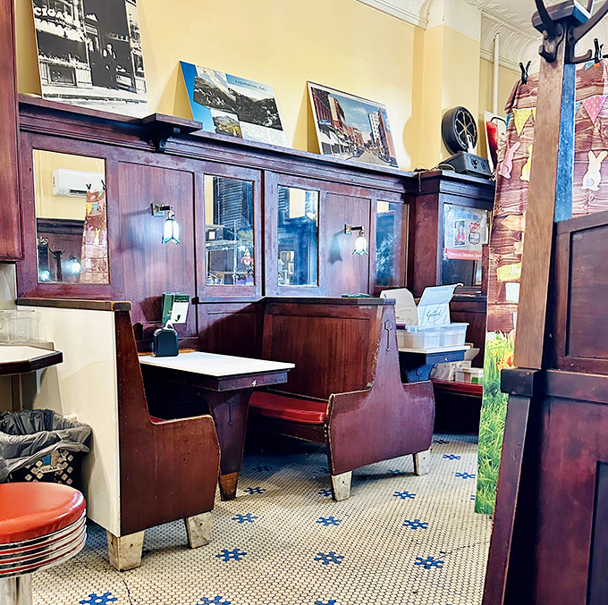 These wooden booths have hosted over a century of ice cream enthusiasts, from first dates in the Roaring Twenties to today's families creating sweet new traditions.