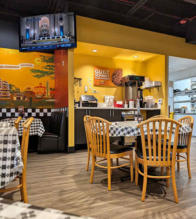 The dining area blends nostalgic deli charm with modern comfort, where every table feels like the best seat in the house.