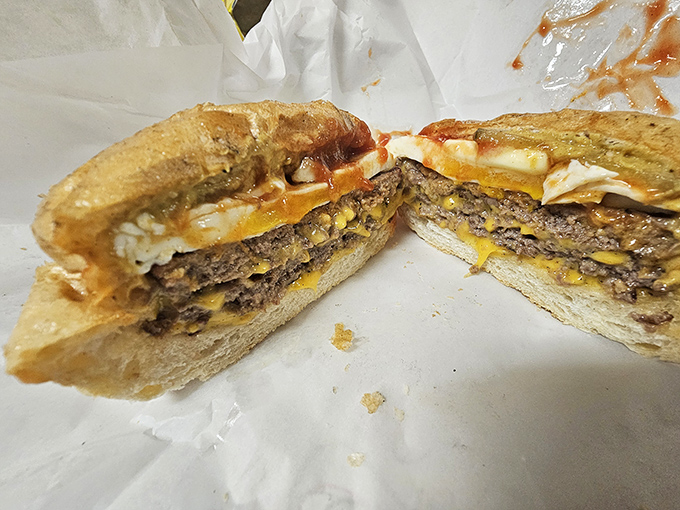 Look at those perfectly melted cheese layers! Mickey-Lu's burgers prove that sometimes less really is so much more.