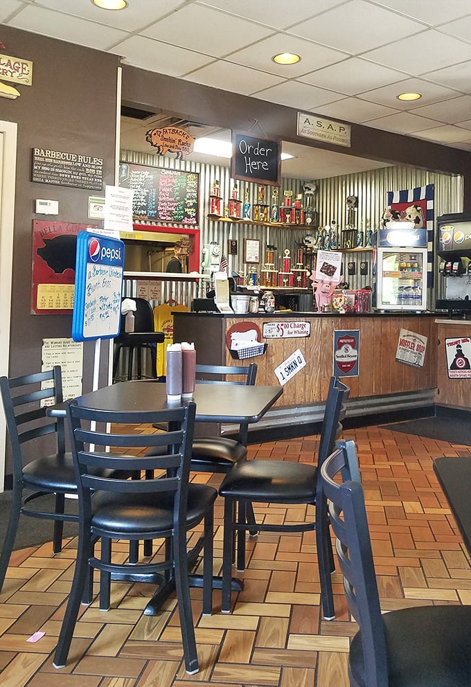A dining area where the focus is squarely where it should be: on plates of smoky, tender meat that makes conversation temporarily impossible.