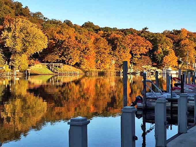 Autumn transforms the Kalamazoo River into a mirror, perfectly reflecting nature's most spectacular wardrobe change &ndash; no filter needed for this Instagram moment.