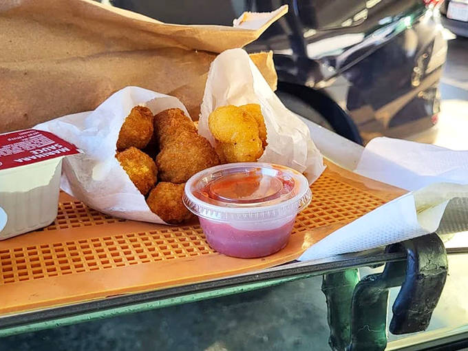 Chicken nuggets that put fast food versions to shame, with dipping sauce that elevates them from simple finger food to legitimate culinary experience.