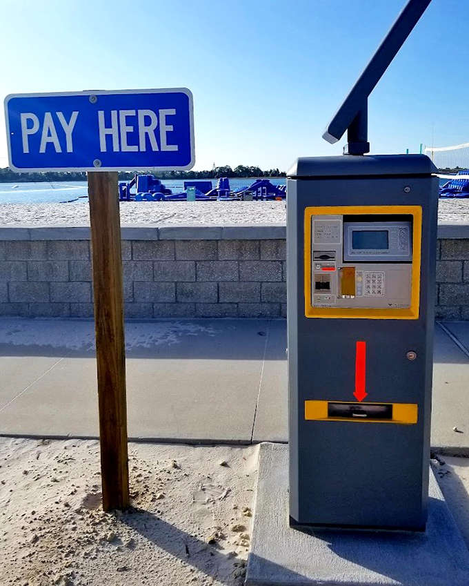 Even the payment kiosk seems excited about what's waiting for you just beyond the parking area.