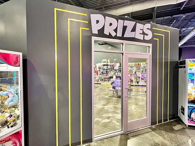 The prize redemption center beckons with its glowing entrance &ndash; where dreams of giant stuffed animals meet the reality of your ticket count.