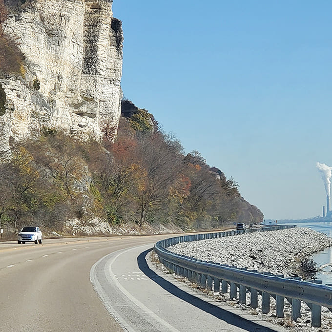 The Great River Road curves alongside limestone bluffs, a ribbon of asphalt that delivers drivers to vistas that no smartphone camera can truly capture.