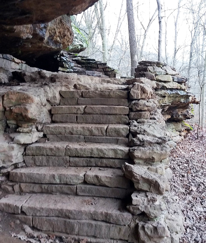 These weathered stone stairs seem to whisper stories of countless hikers who've ventured into the canyon's depths over decades.