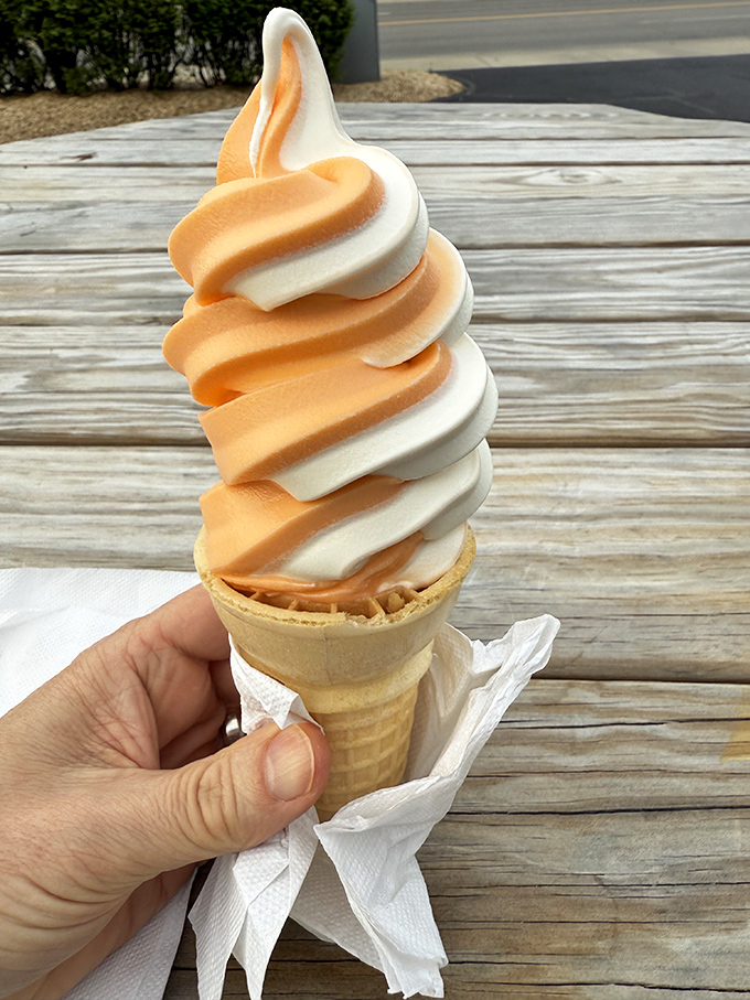A perfect twist of vanilla and orange soft serve – the ice cream equivalent of a summer sunset swirled into edible form.