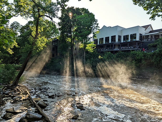 Misty morning magic as sunlight filters through spray rising from the churning waters below 17 River Grille's picture-perfect vantage point.