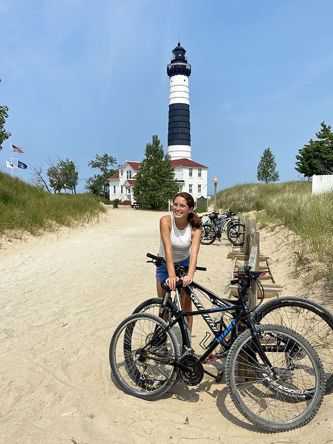 Bike racks near the lighthouse prove that some adventurous souls pedal the two miles through Ludington State Park, earning their spectacular views the old-fashioned way.