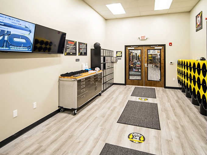 Sleek hallways lined with racing heritage lead you deeper into this temple of speed, building anticipation with every step.