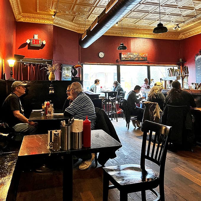 The dining room buzzes with conversation as patrons enjoy the warm atmosphere and hearty Irish fare.