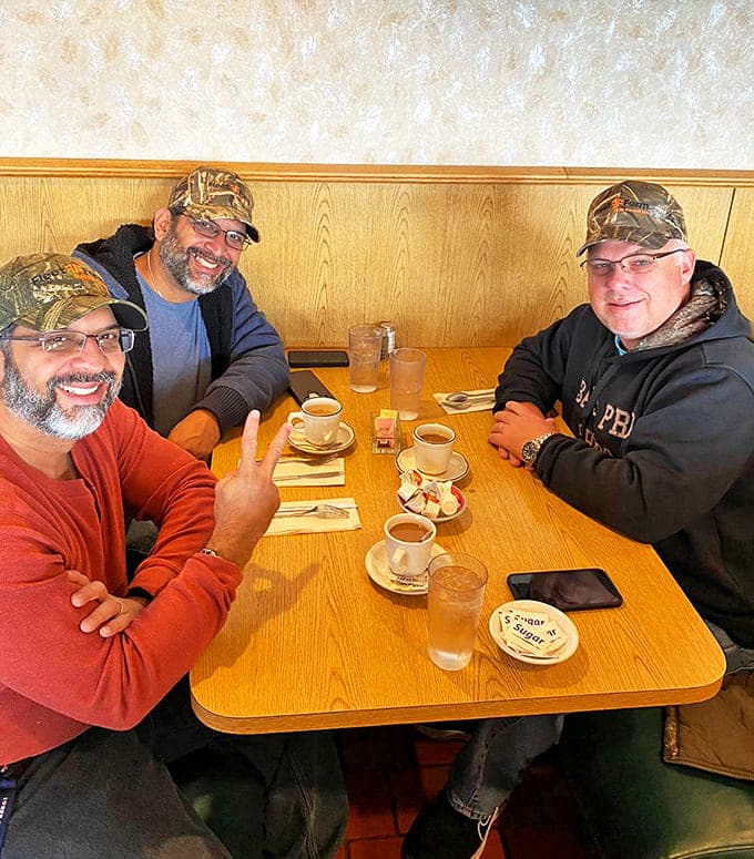 The true measure of a great local spot: tables filled with friends catching up over steaming mugs and hearty plates.