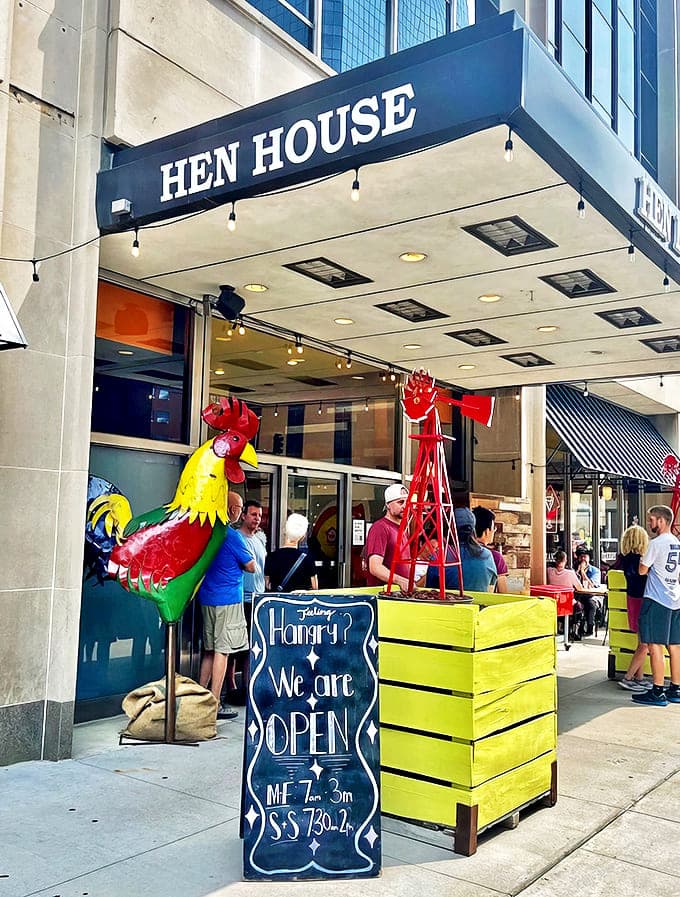 The turquoise-framed storefront beckons curious passersby with its neon mammoth sign and window displays that scream "normal shopping rules don't apply here."